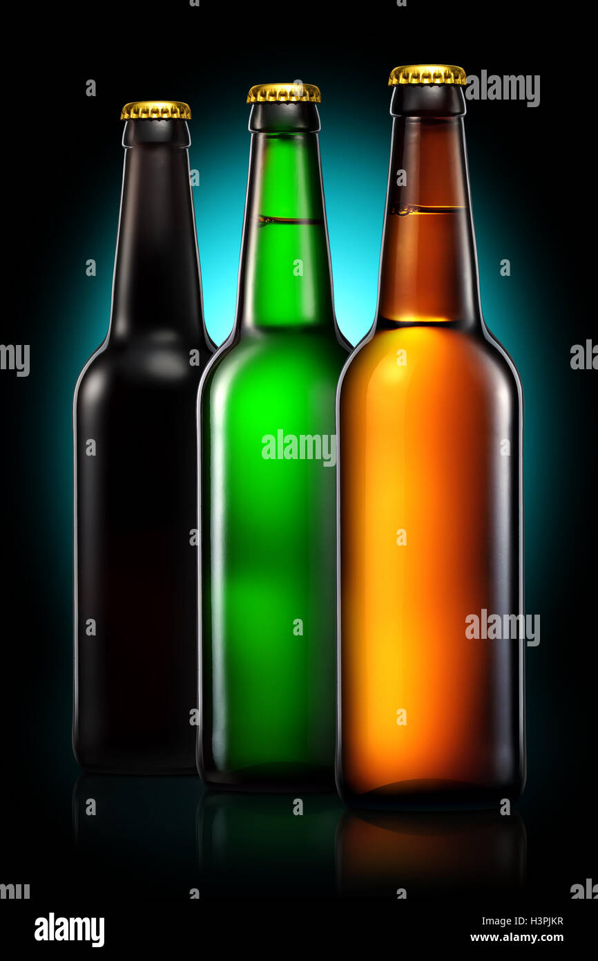 Set of beer bottles isolated on black background Stock Photo - Alamy