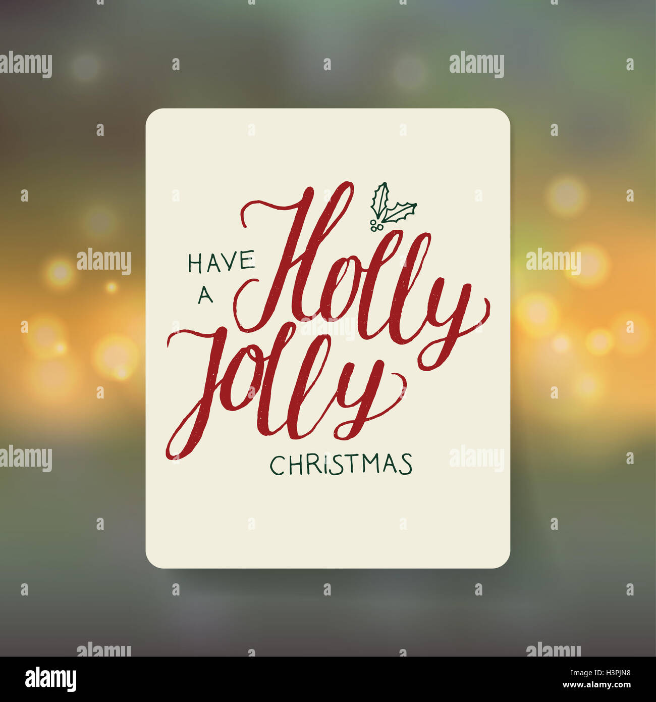 holly jolly handwriting note. bokeh background Stock Photo - Alamy