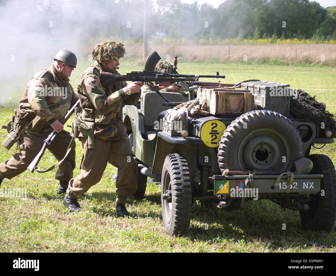 Reenactors portraying British world war two soldiers during a battle ...