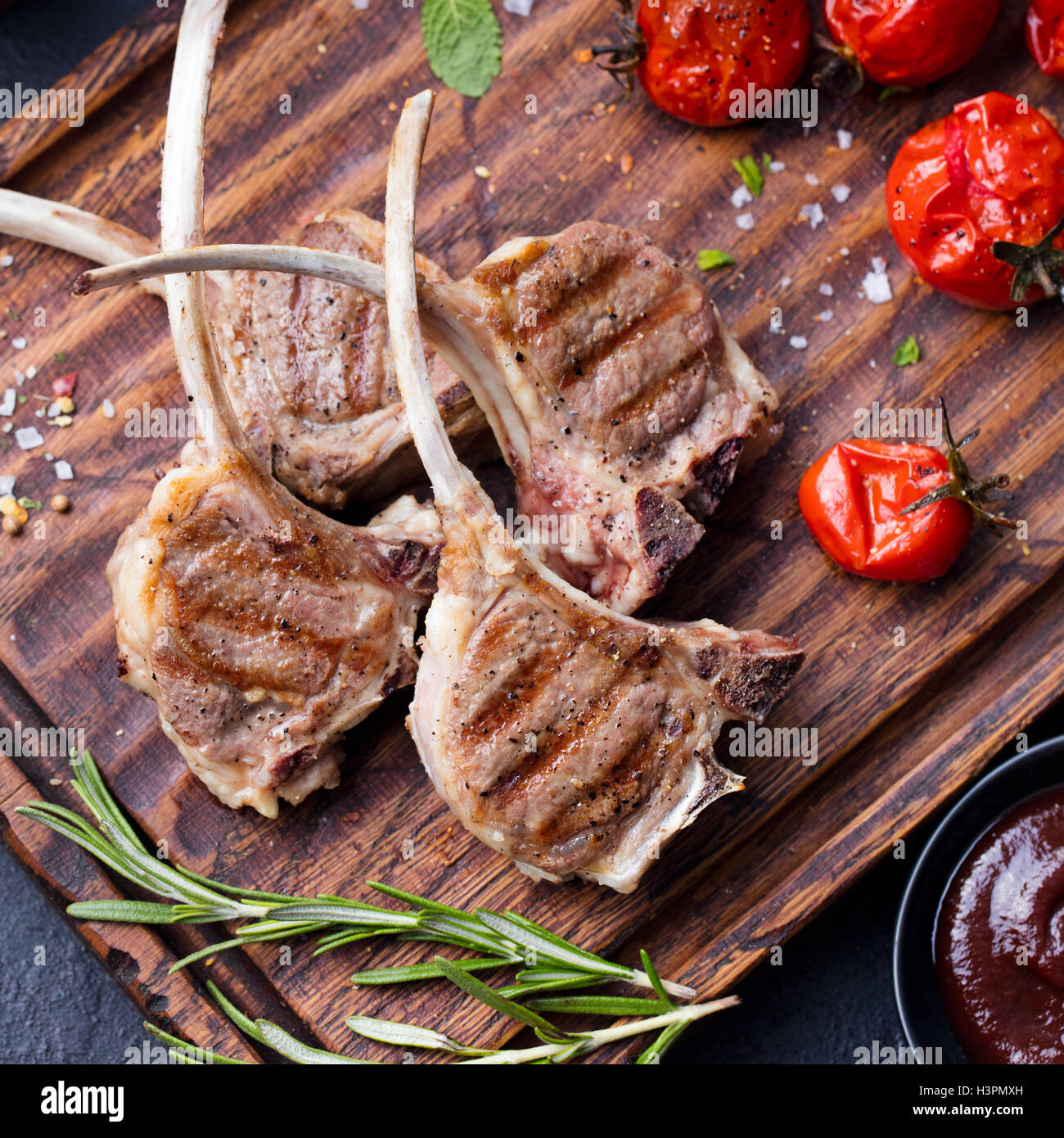Lamb ribs grilled with vegetables Top view Stock Photo - Alamy