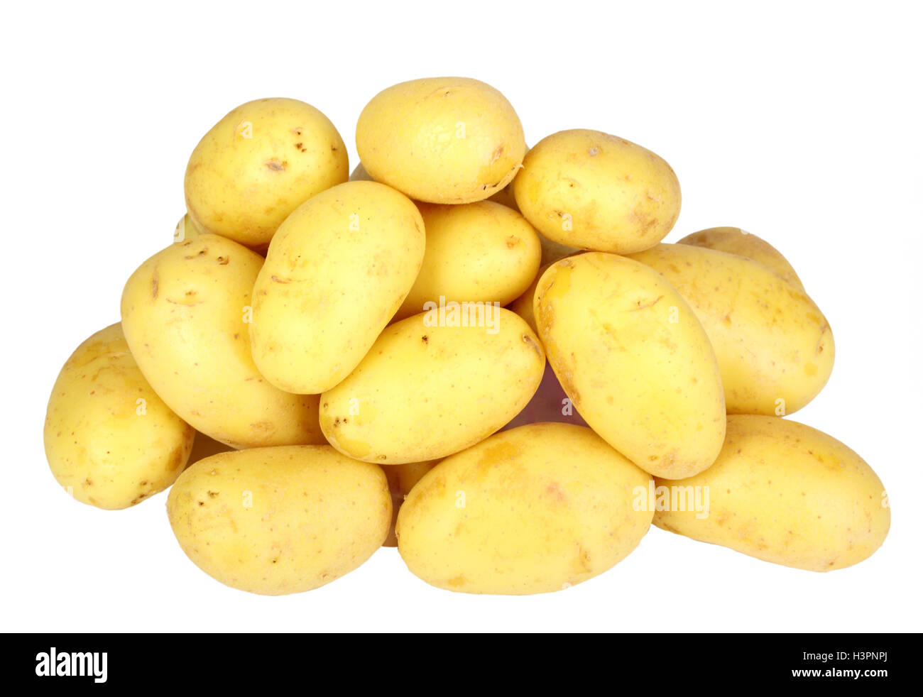 Heap of yellow raw potatos Stock Photo - Alamy