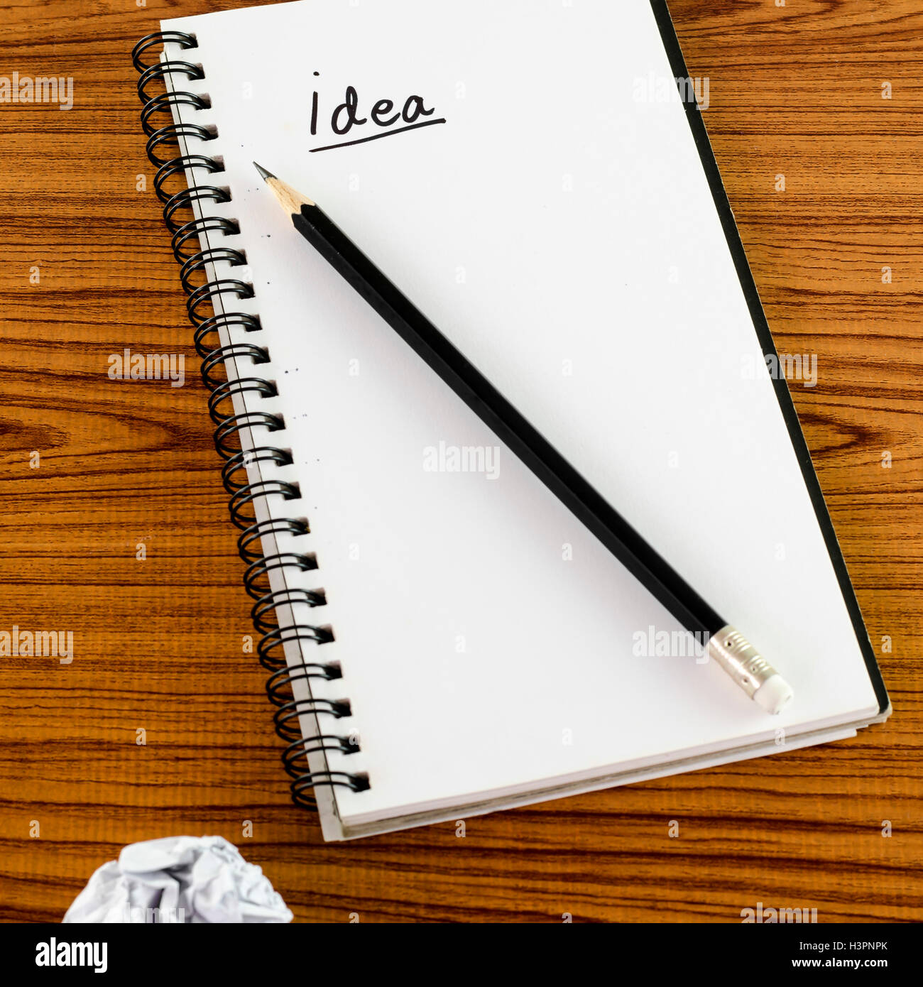 crumpled paper and pencil with notebook Stock Photo - Alamy