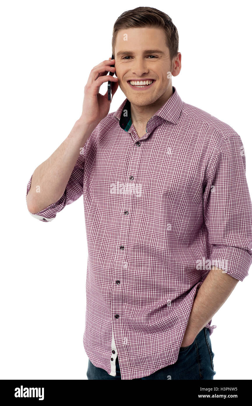 Handsome young man communicating Stock Photo - Alamy