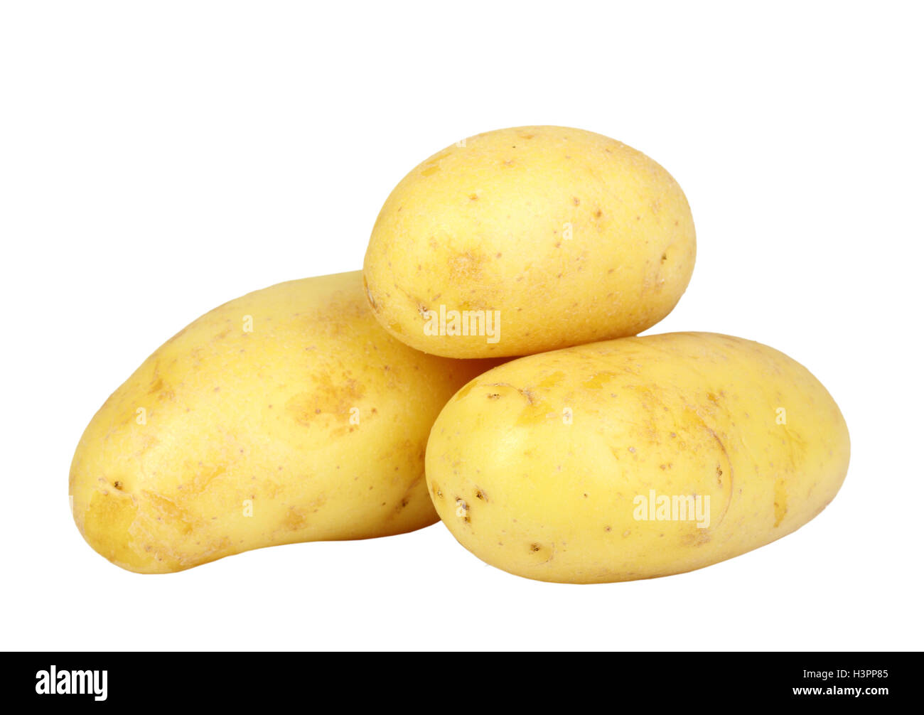 Heap of yellow raw potatos Stock Photo - Alamy