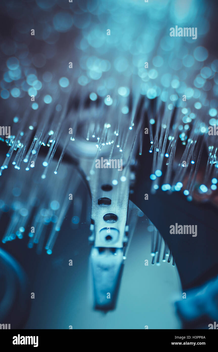 reader, mechanism inside hard disk with fiber optic lights Stock Photo ...