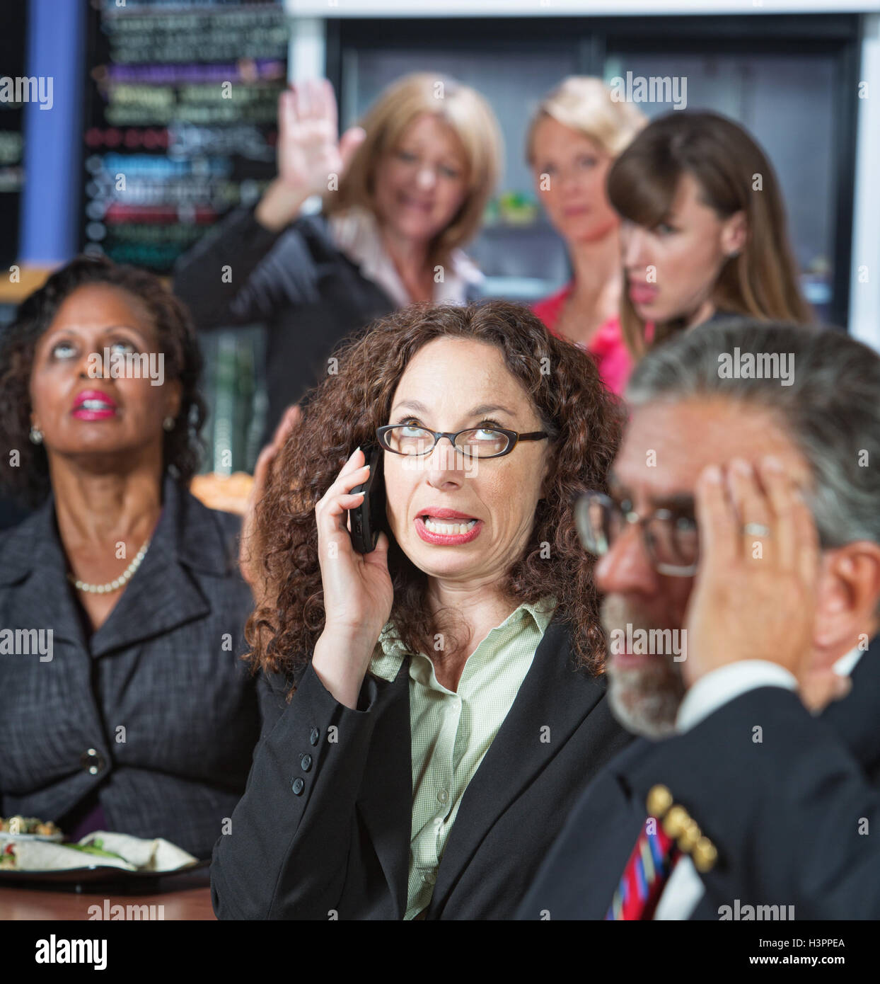 Loud Coworker on Phone Stock Photo - Alamy