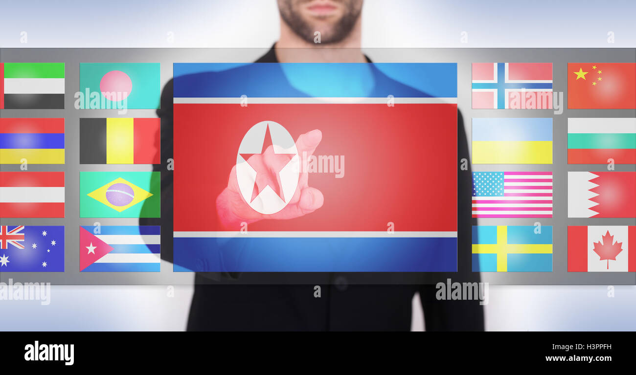 Hand pushing on a touch screen interface Stock Photo - Alamy