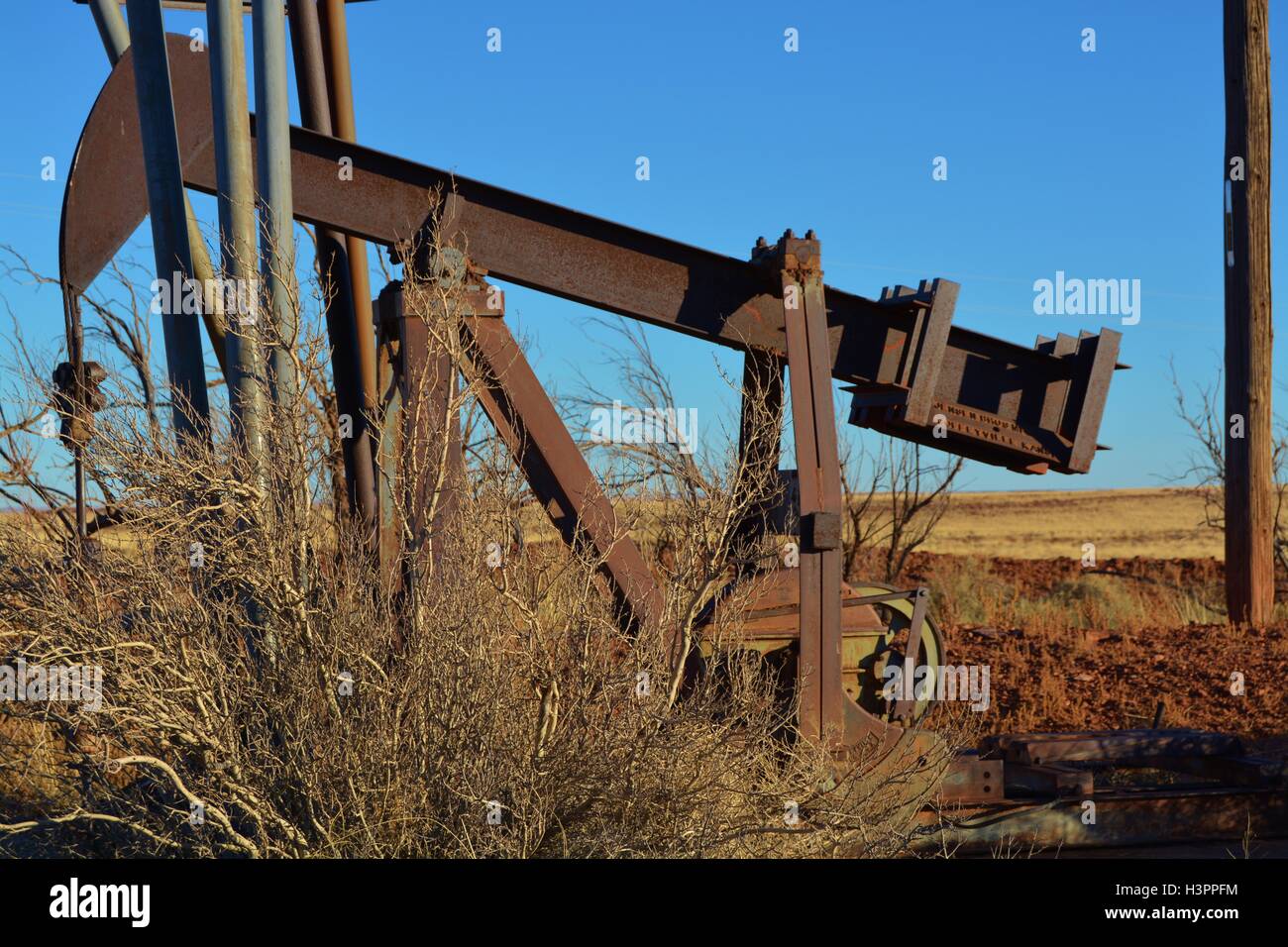 Old Rustic obsolete Abandon oil well Oil Rig Pump in desolate rural ...