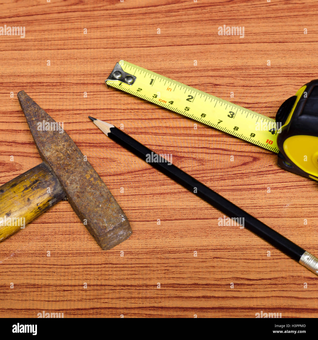 hammer measuring tape and pencil Stock Photo - Alamy