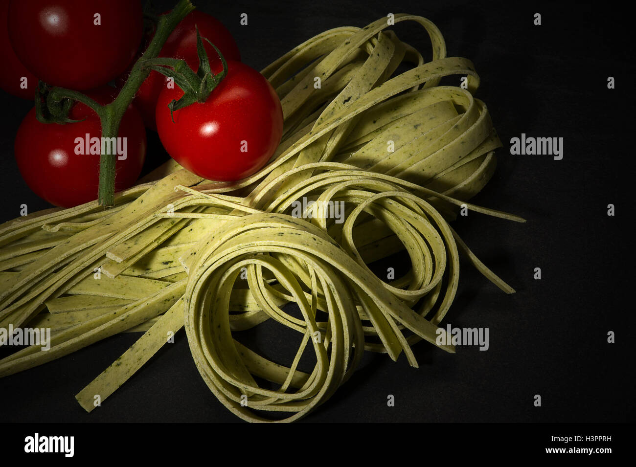 Coiled dried tagliatelle Italian pasta Stock Photo - Alamy