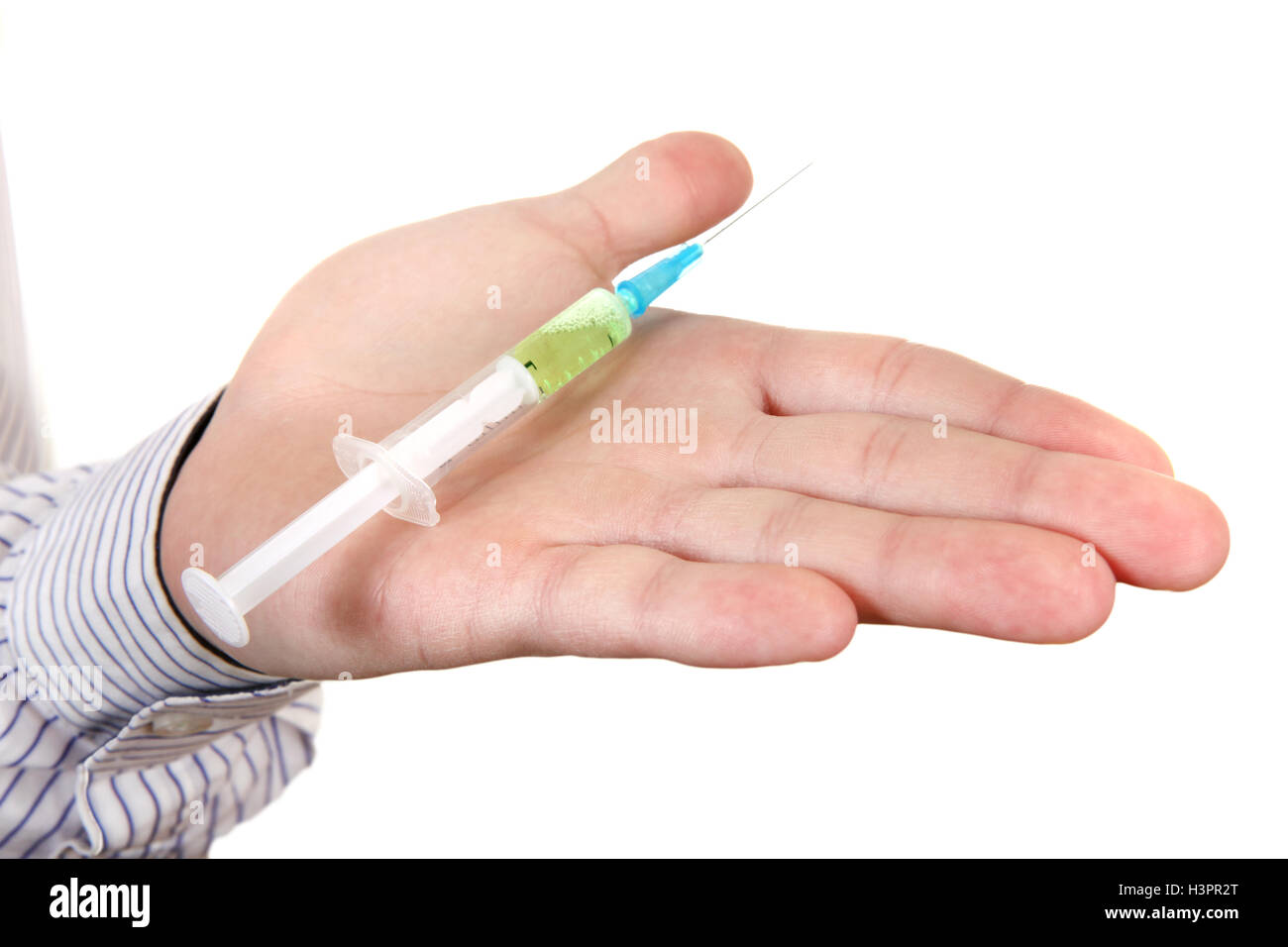 Syringe in a Hand Stock Photo - Alamy