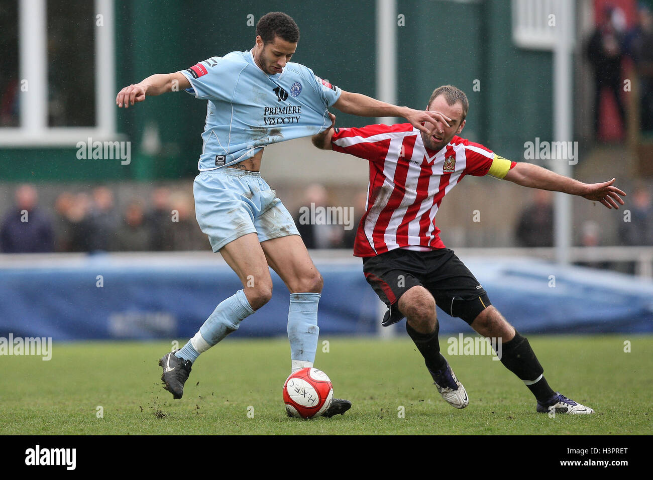 Courtney White of Billericay tussles with Elliot Styles of Hornchurch ...