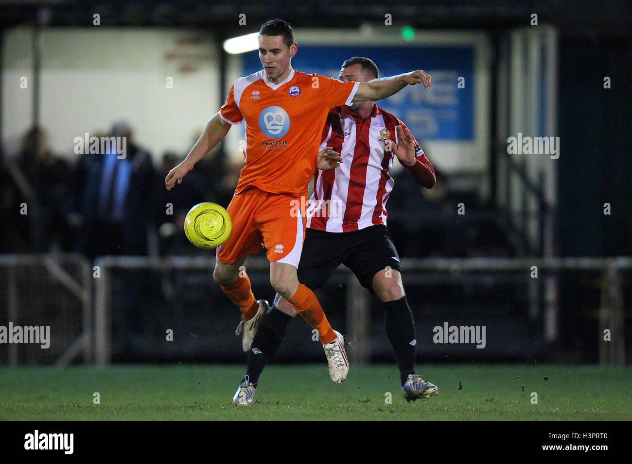 Dan Sparkes of Braintree shields the ball from Billy Coyne of ...