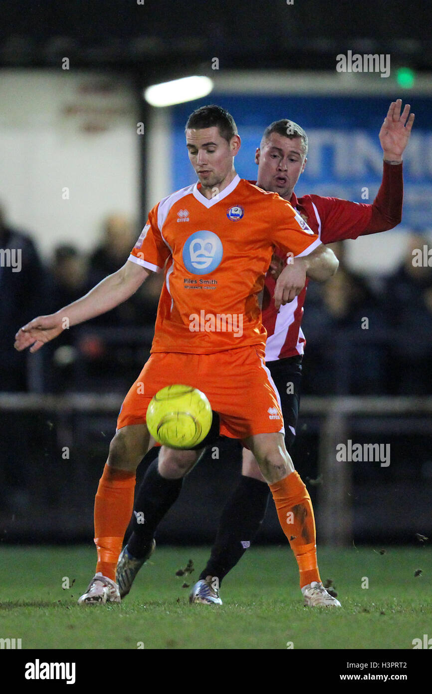 Dan Sparkes of Braintree shields the ball from Billy Coyne of ...