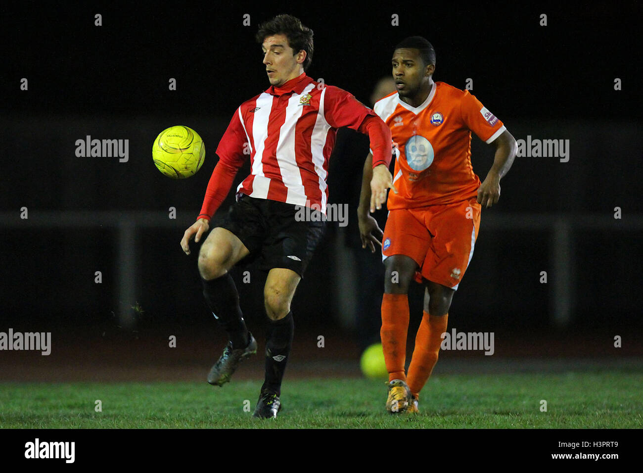 Leigh Bremner of Hornchurch shields the ball from Ryan Peters of ...