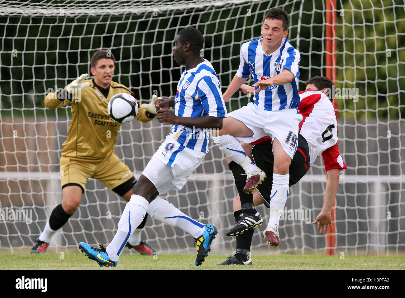 Medi Elito and Craig Arnott of Colchester tangle with Jamie Dormer ...