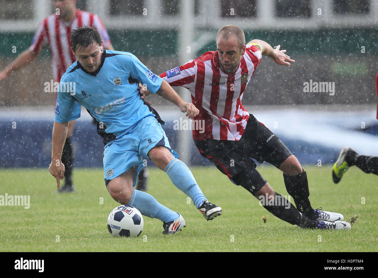 Elliot Styles of Hornchurch keeps a close eye on Jamie Smith - AFC ...