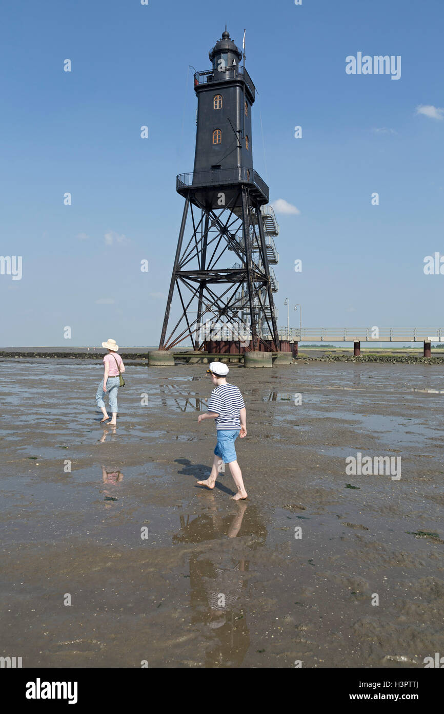 Woman walking barefoot in mud hi-res stock photography and images - Alamy