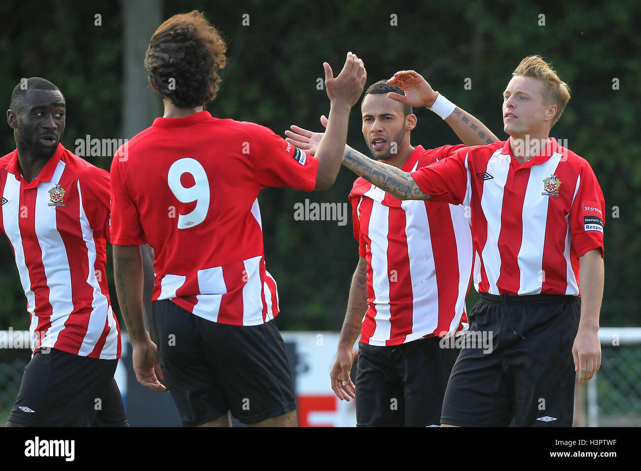 George Purcell (R) is congratulated by his team mates on scoring the ...