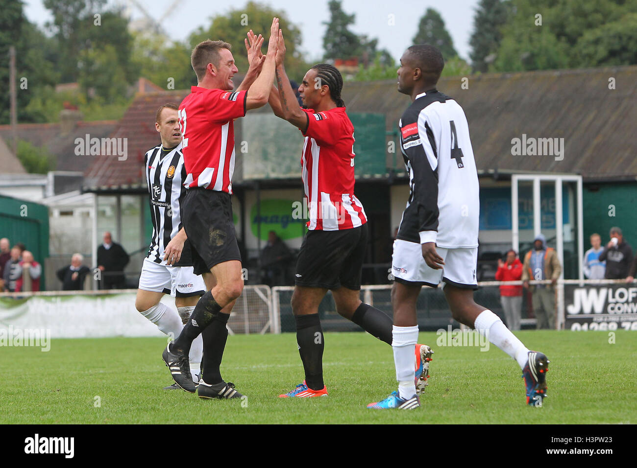 Carl Rook (L) celebrates scoring the equalising goal for Hornchurch ...
