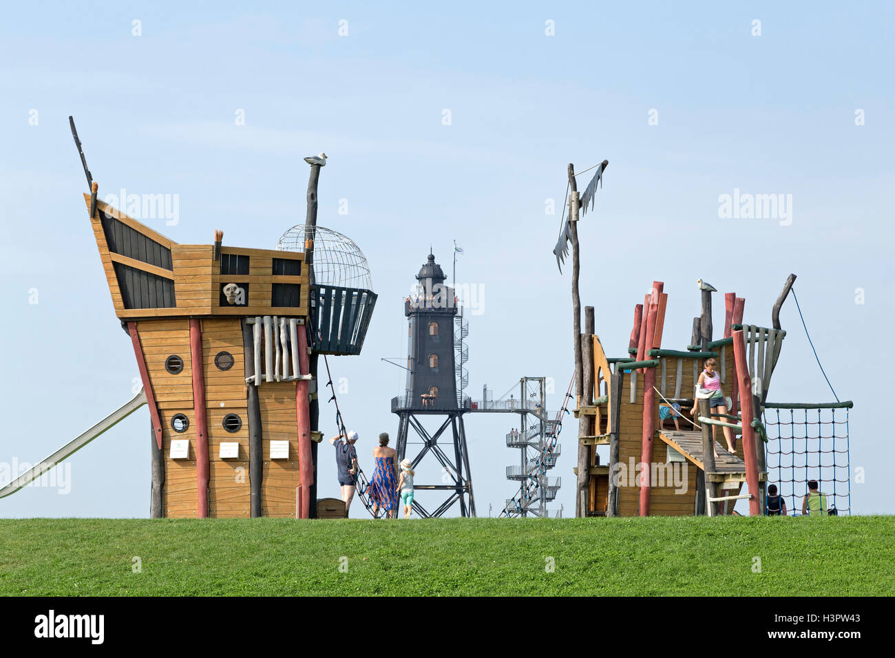 playground and lighthouse, Dorum, Wurster Land, Lower Saxony, Germany ...