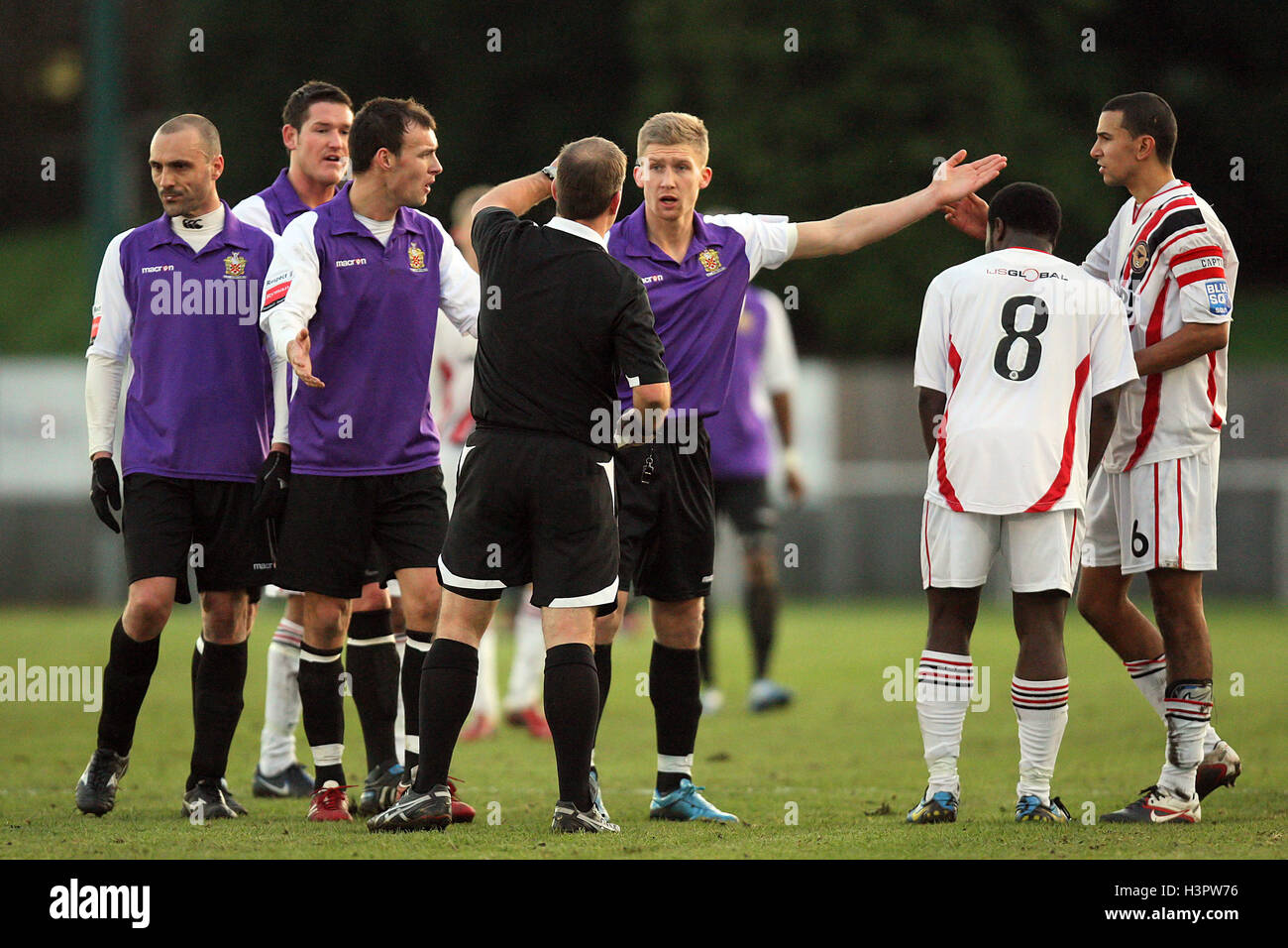 Lewis Smith of Hornchurch protests after being shown a red card by ...