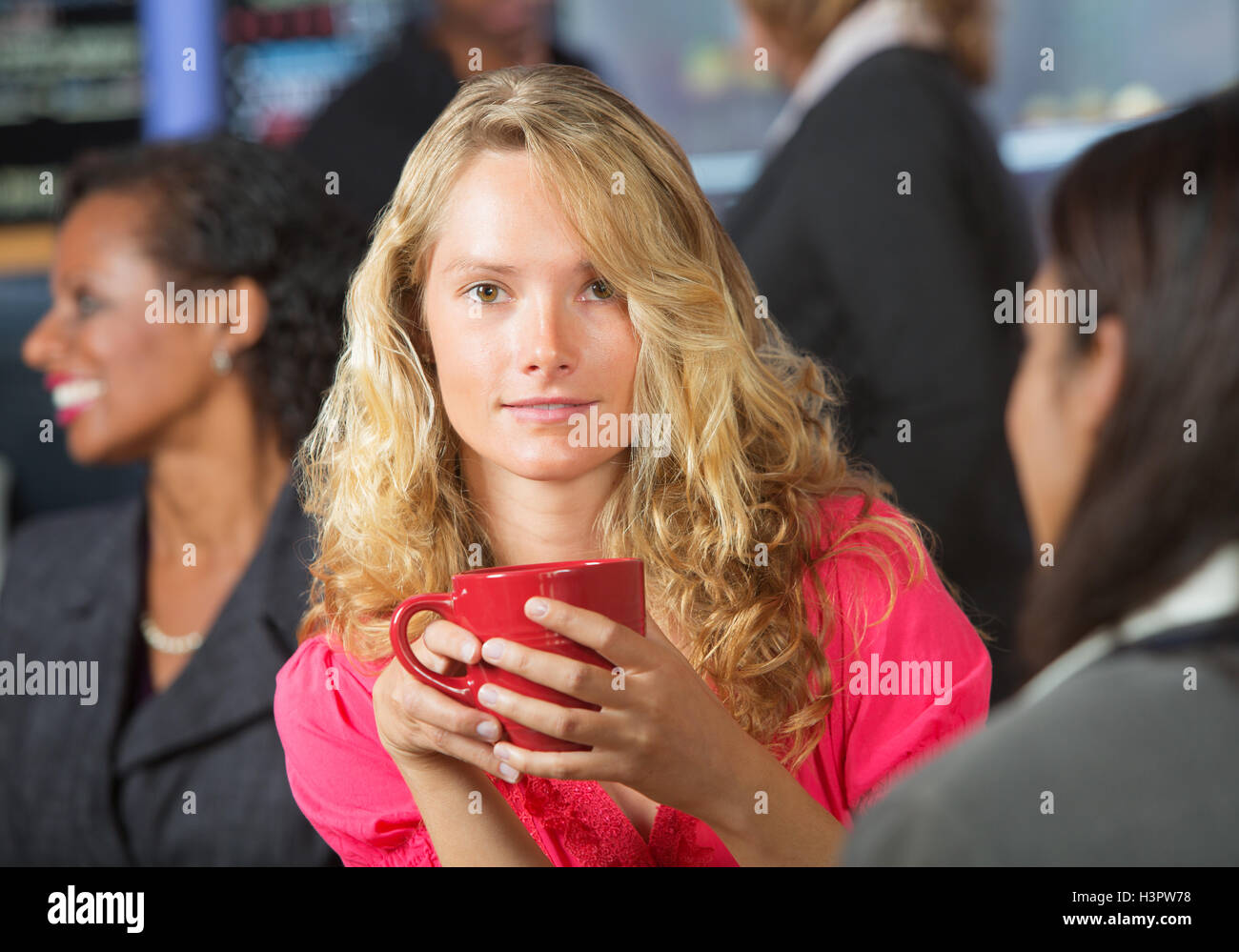 Woman with Red Mug Stock Photo - Alamy