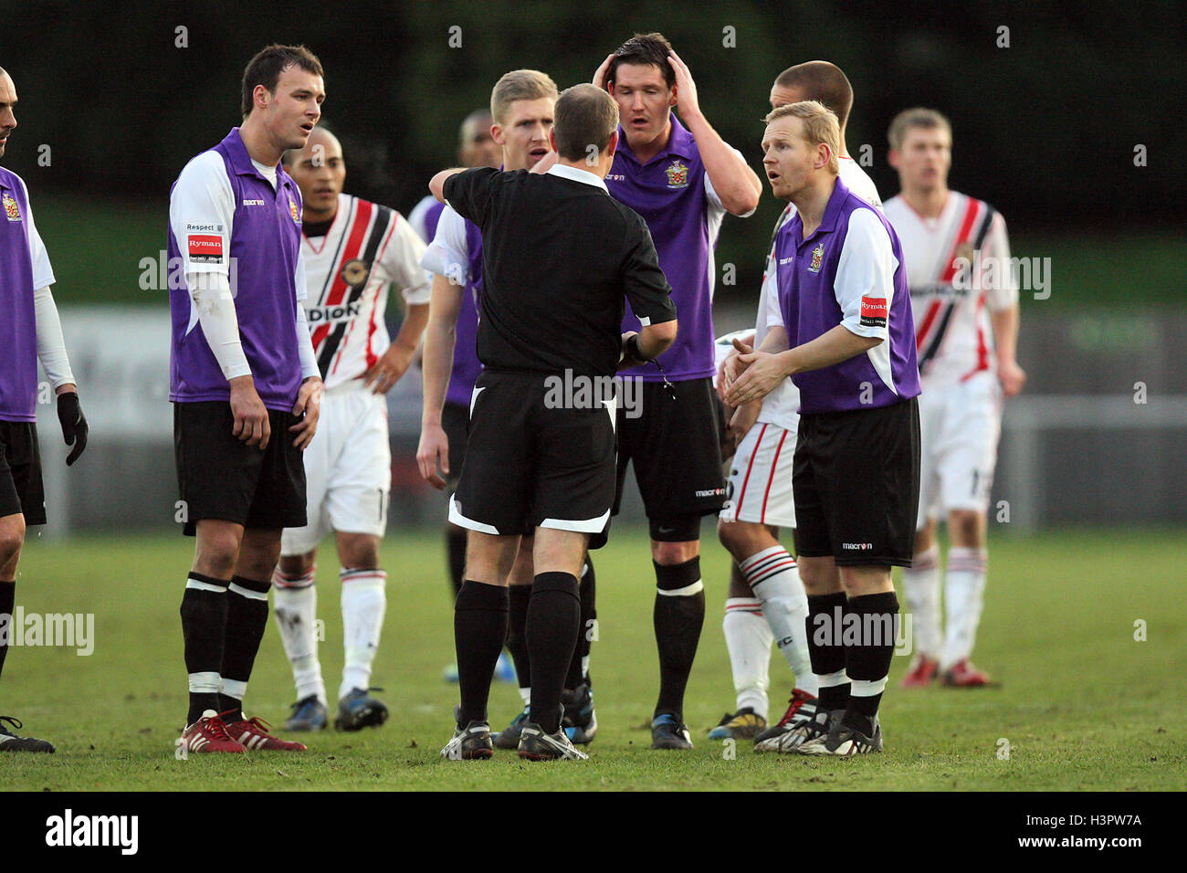 Lewis Smith of Hornchurch protests after being shown a red card by ...