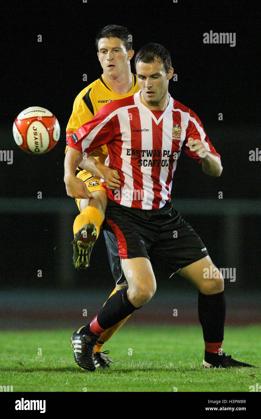 Martin Tuohy of Hornchurch shields the ball from Frankie Chappell of ...