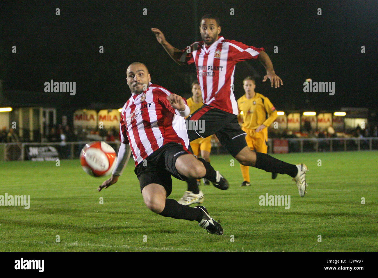 Jonathan Hunt and Michael Spencer of Hornchurch try in vain to follow ...