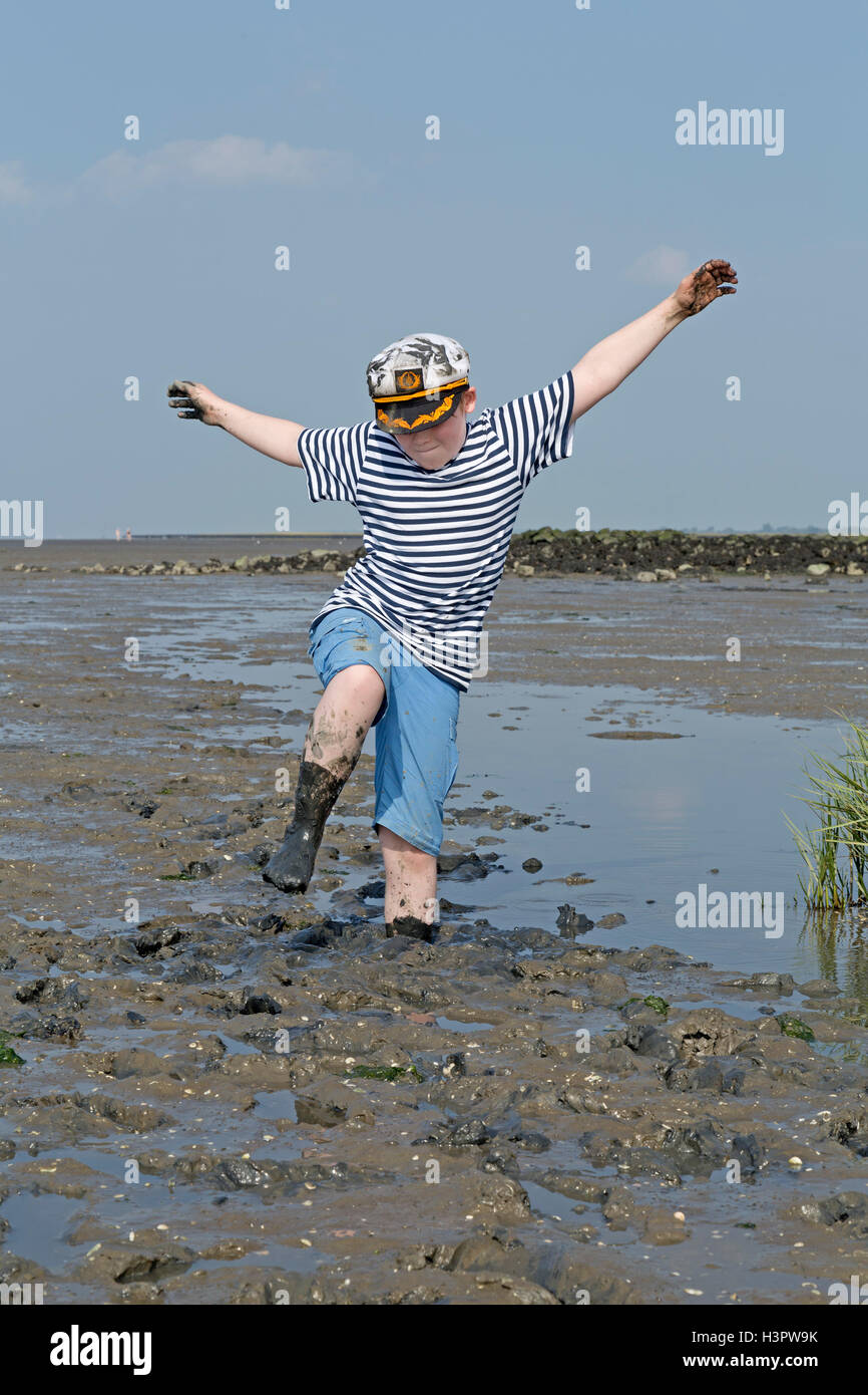 Children stuck in mud hi-res stock photography and images - Alamy