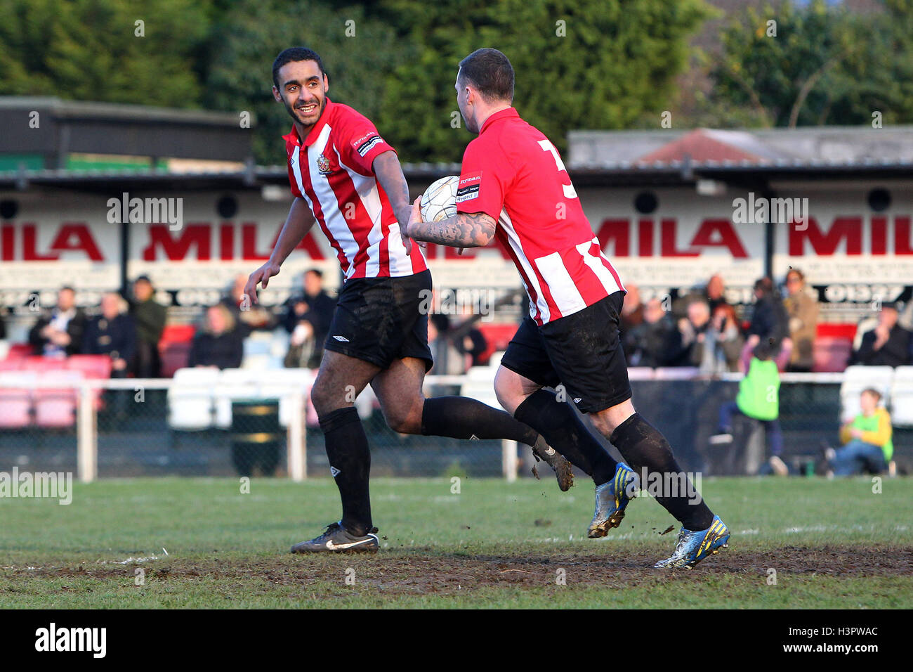 Stefan Payne (L) congratulates Billy Coyne on his goal for Hornchurch ...