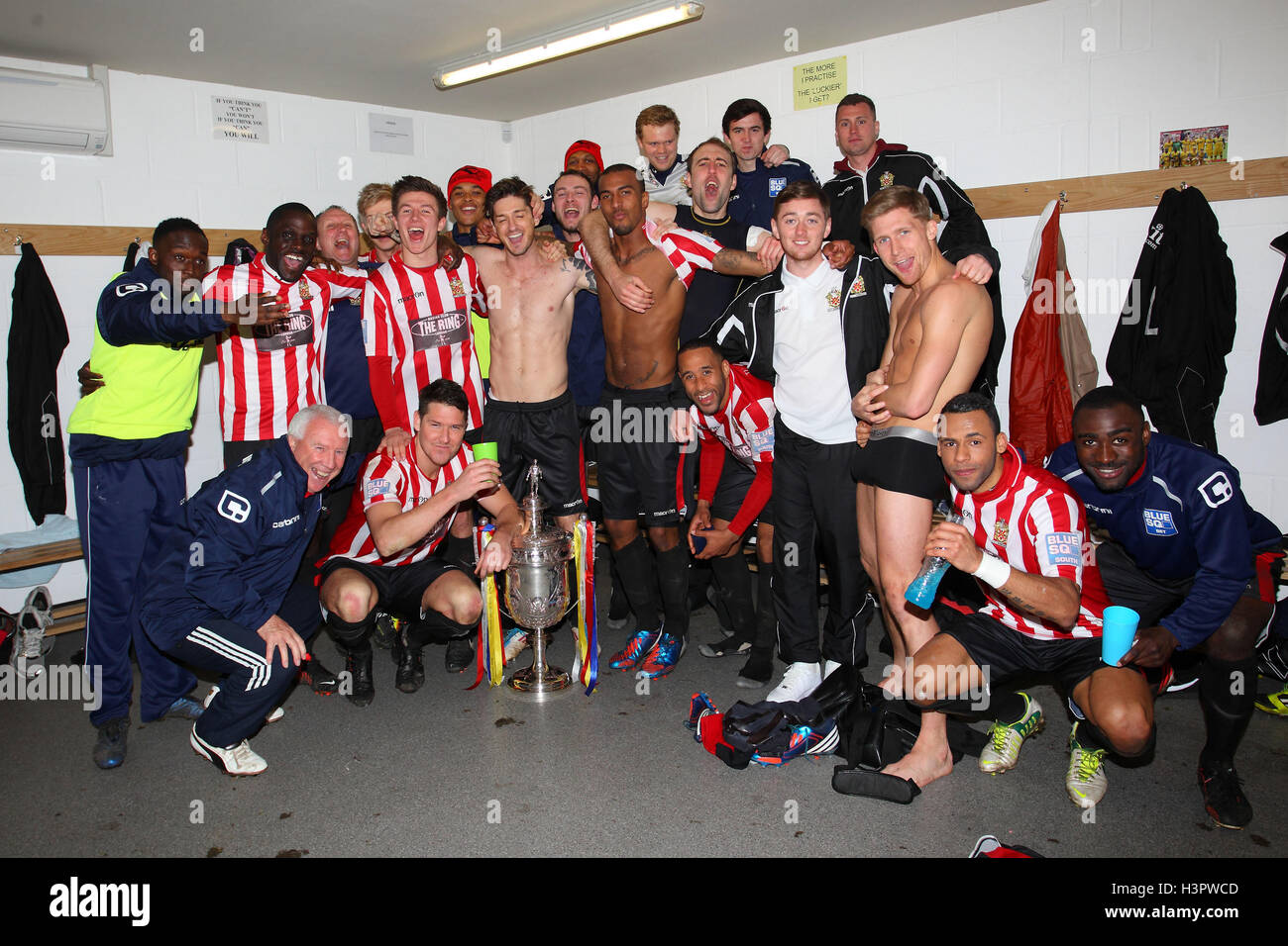 AFC Hornchurch players celebrate with the Cup in the dressing room ...