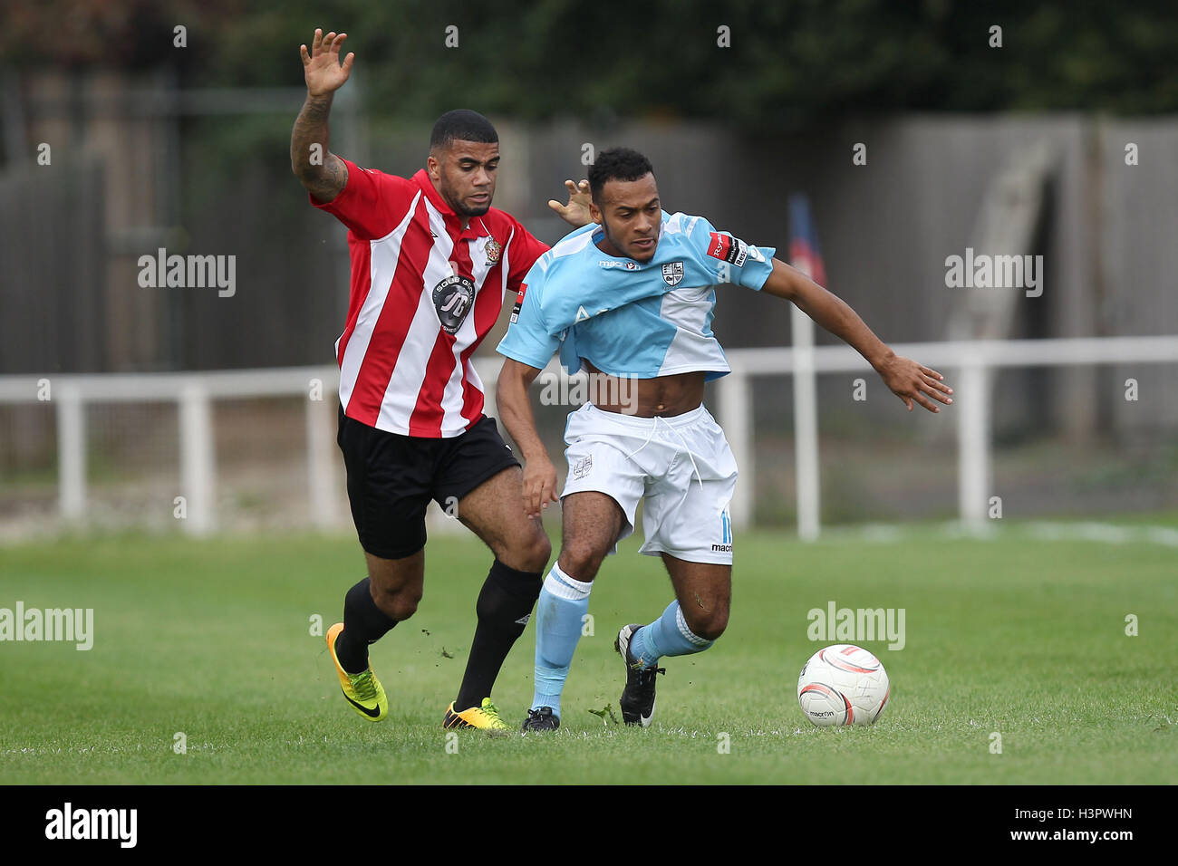 Courtney Homans of AFC Hornchurch tangles with Jerome Federico of ...