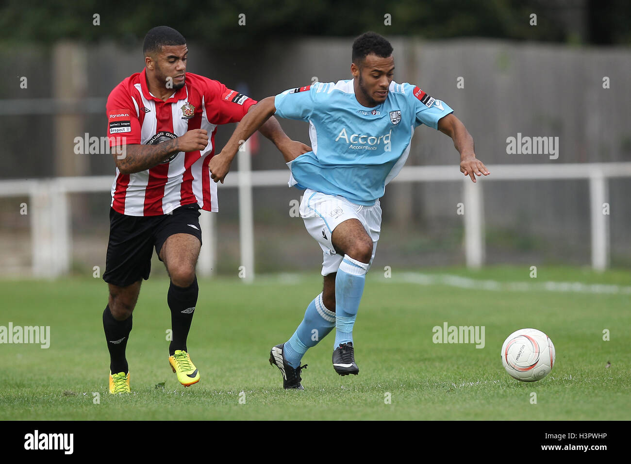 Courtney Homans of AFC Hornchurch tangles with Jerome Federico of ...