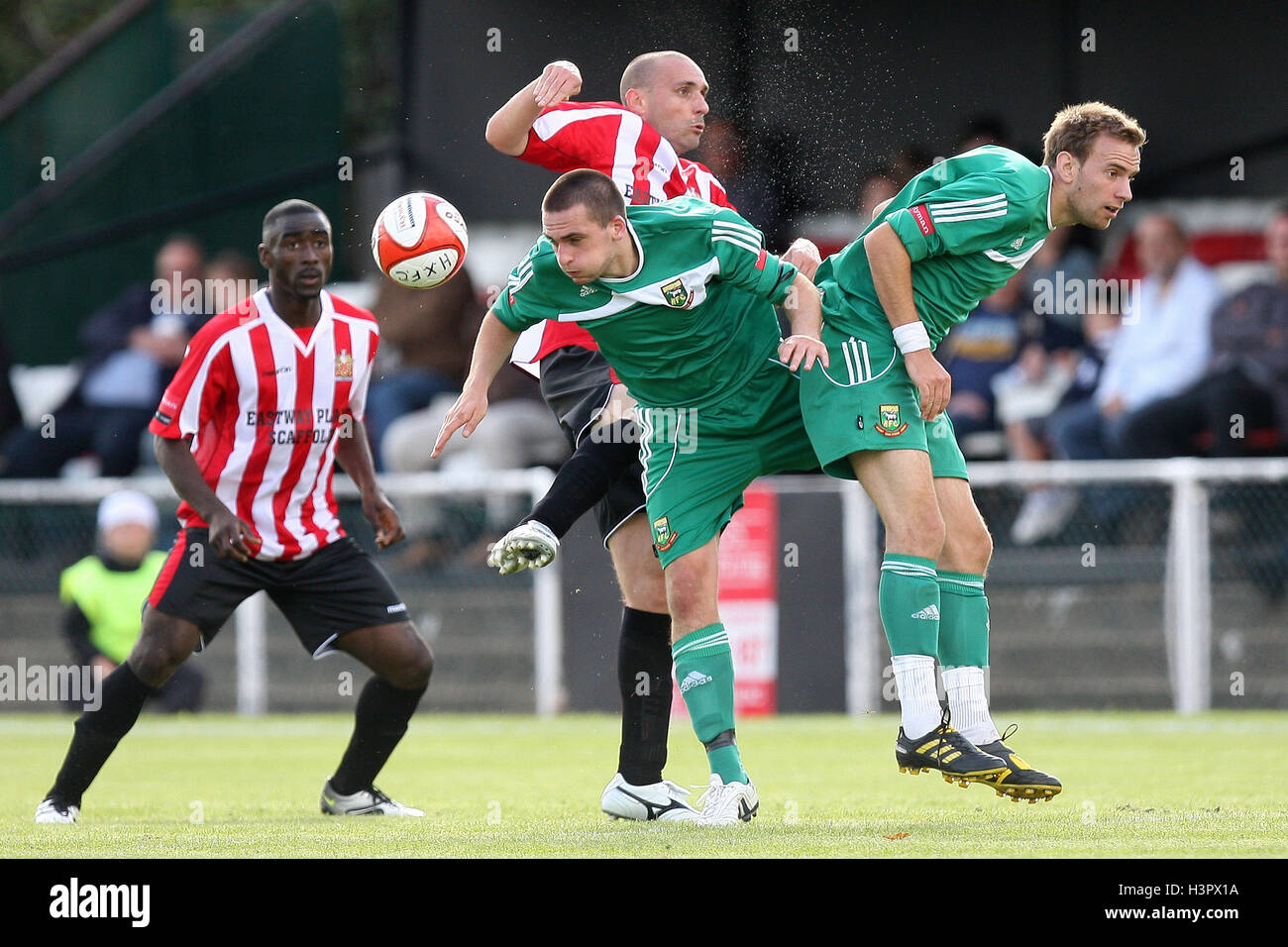 Jonathan Hunt (2nd R) of Hornchurch in a battle for the ball with Lee O ...