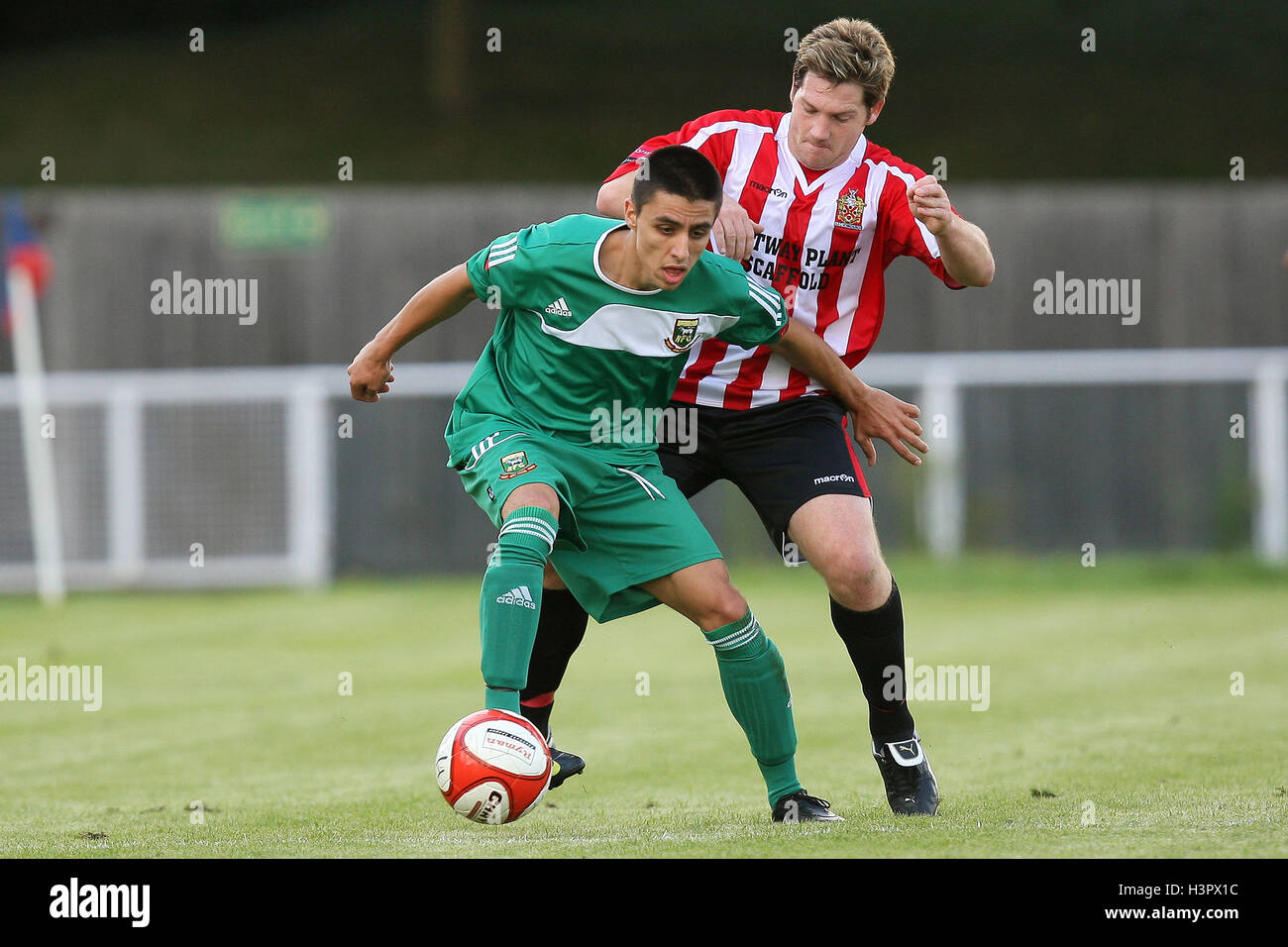 Lubomir Guentchev of Hendon shields the ball from Tommy Black - AFC ...