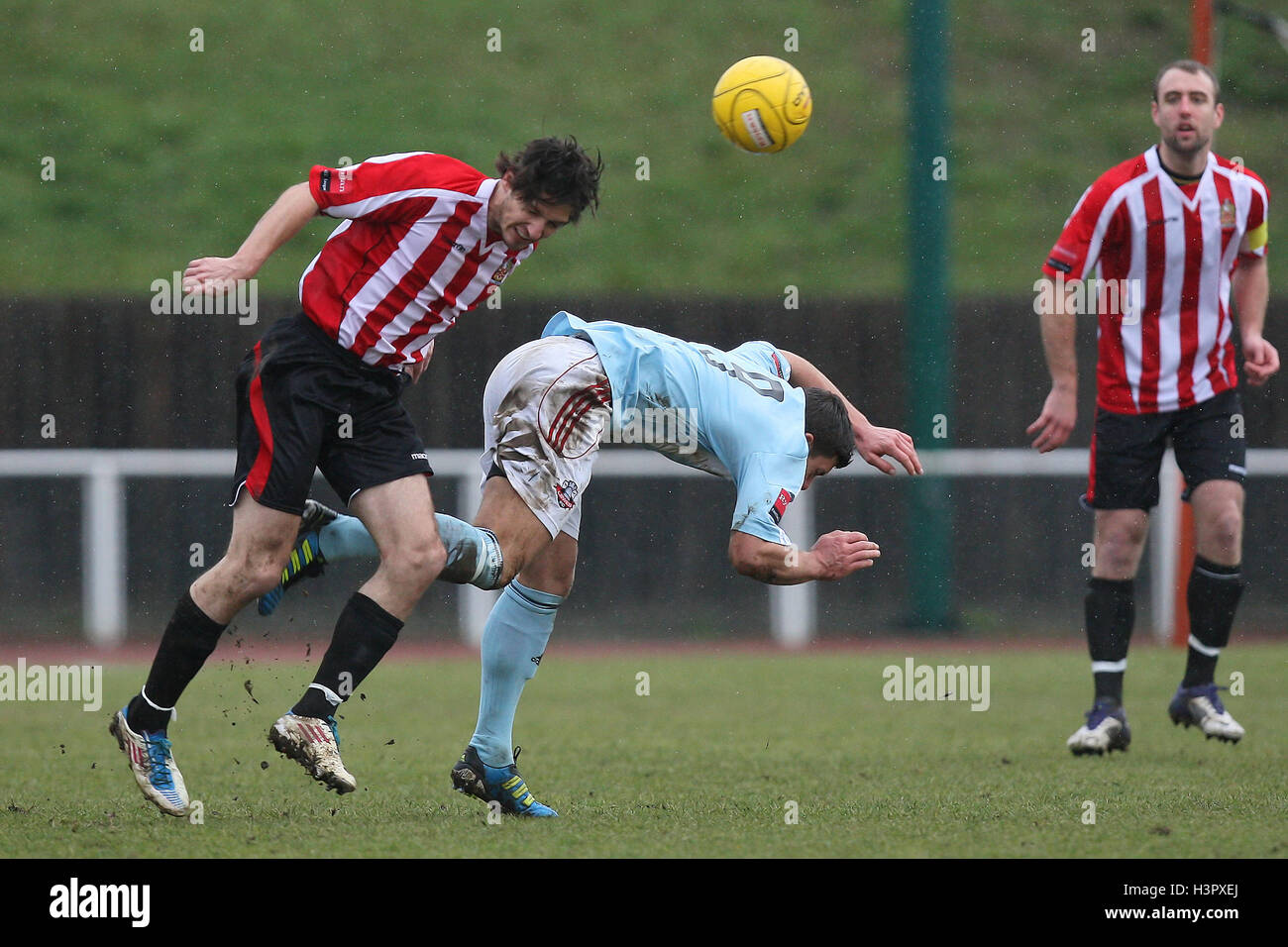 Simon Glover of Hornchurch tangles with Jack Walder of Lewes - AFC ...