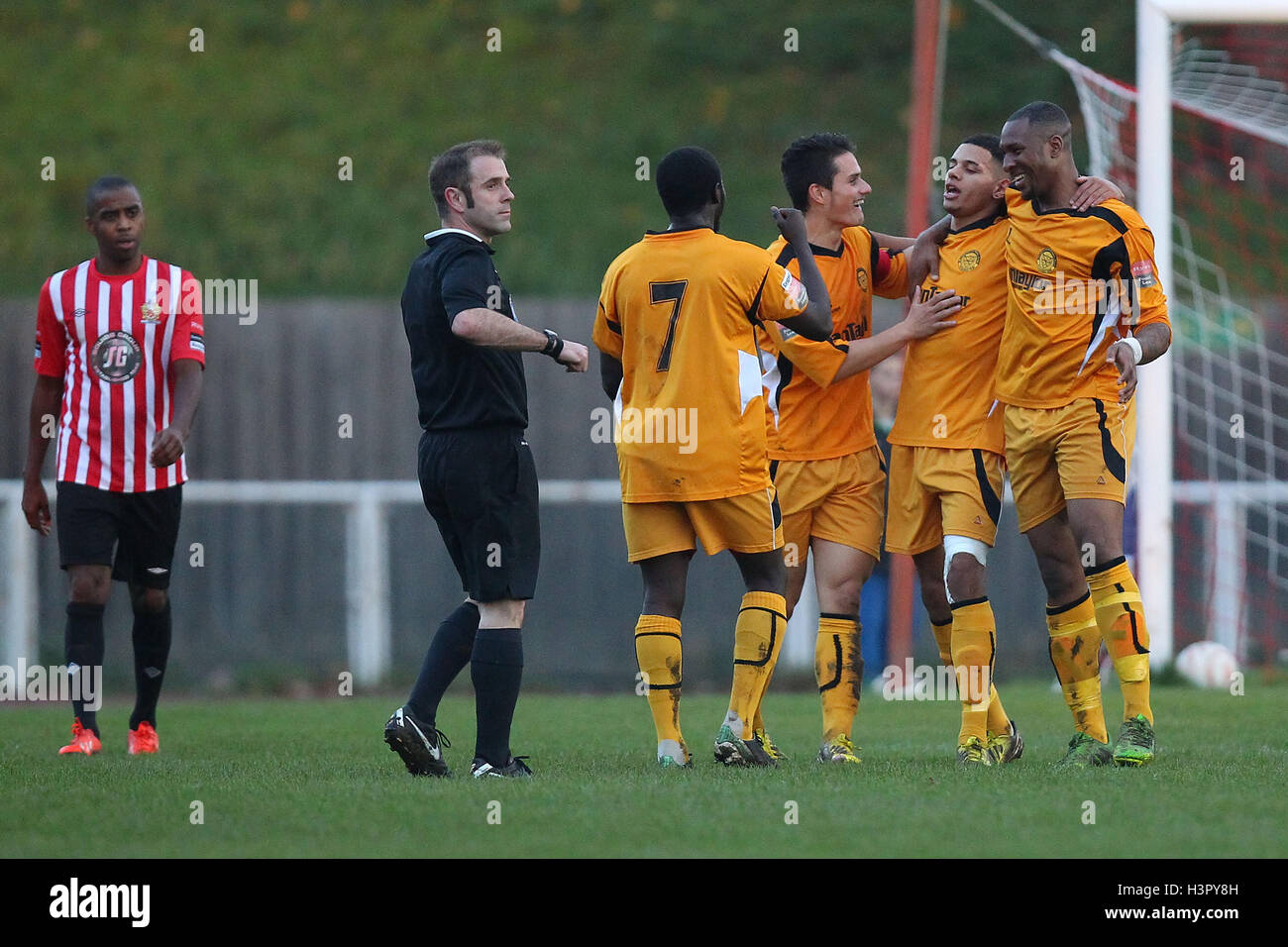 Aaron Rhule scores the second goal for Merstham and celebrates - AFC ...