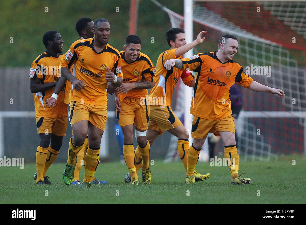 Aaron Rhule scores the second goal for Merstham and celebrates - AFC ...