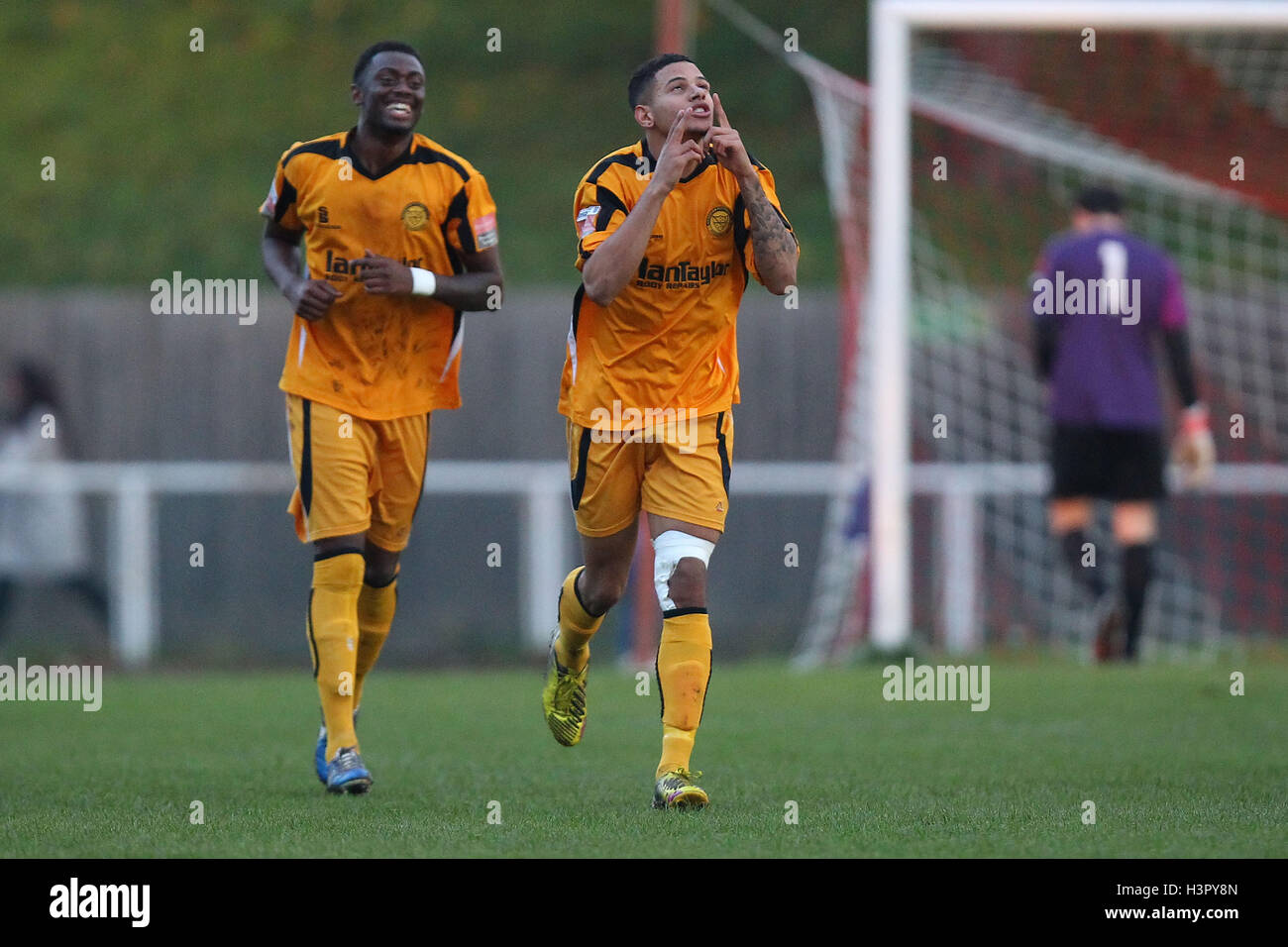 Aaron Rhule scores the second goal for Merstham and celebrates - AFC ...