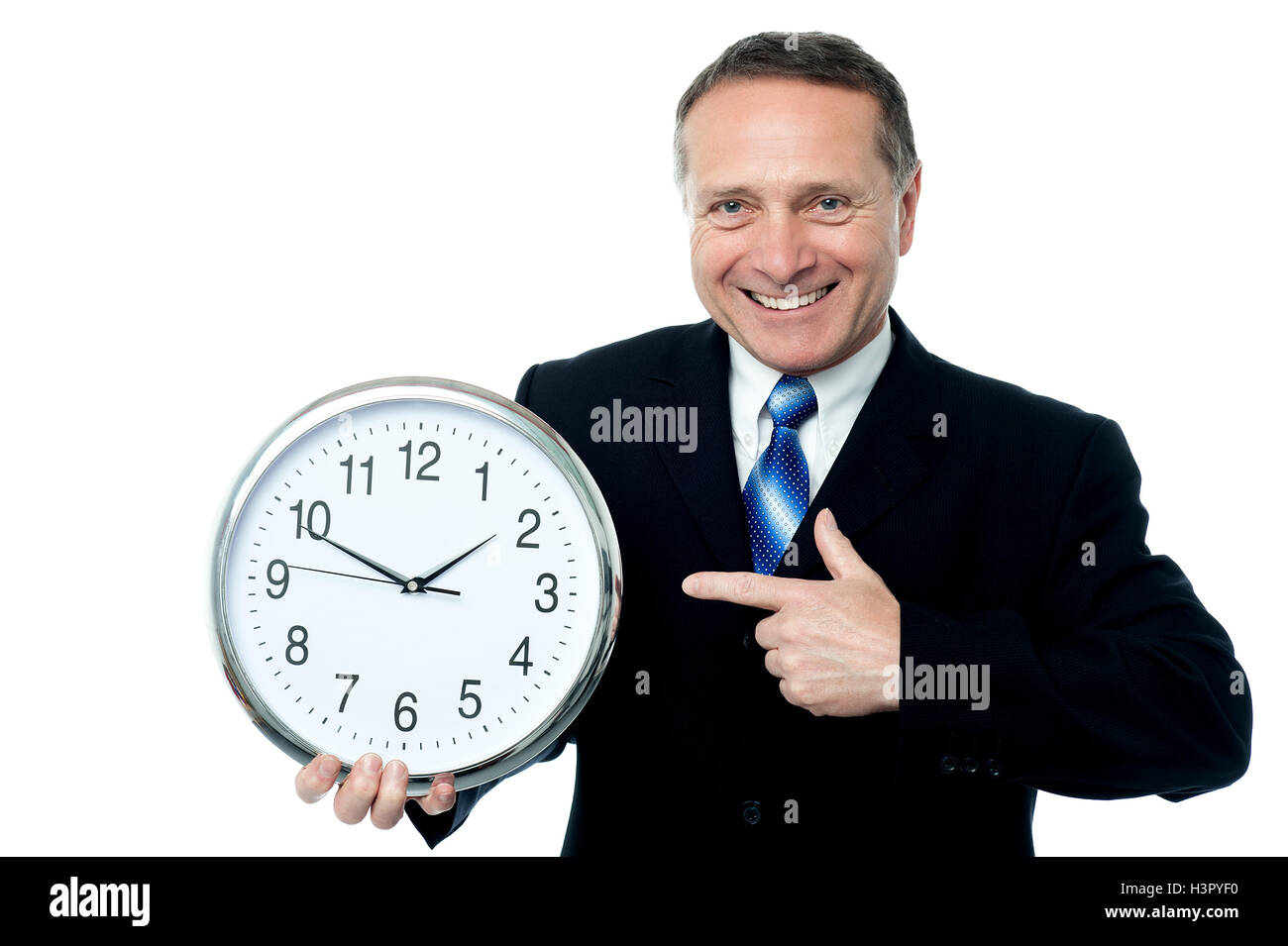 Clock is in business man hands Stock Photo - Alamy