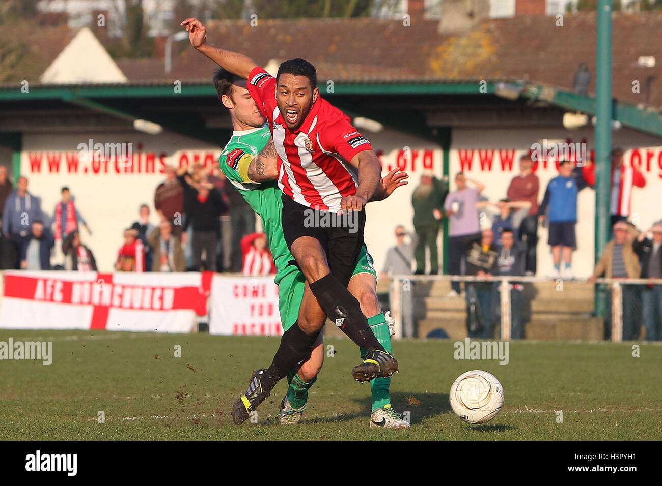 Dave Rainford of Hornchurch takes a tumble in the penalty area under ...