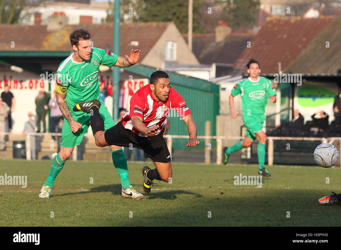 Dave Rainford of Hornchurch takes a tumble in the penalty area under ...