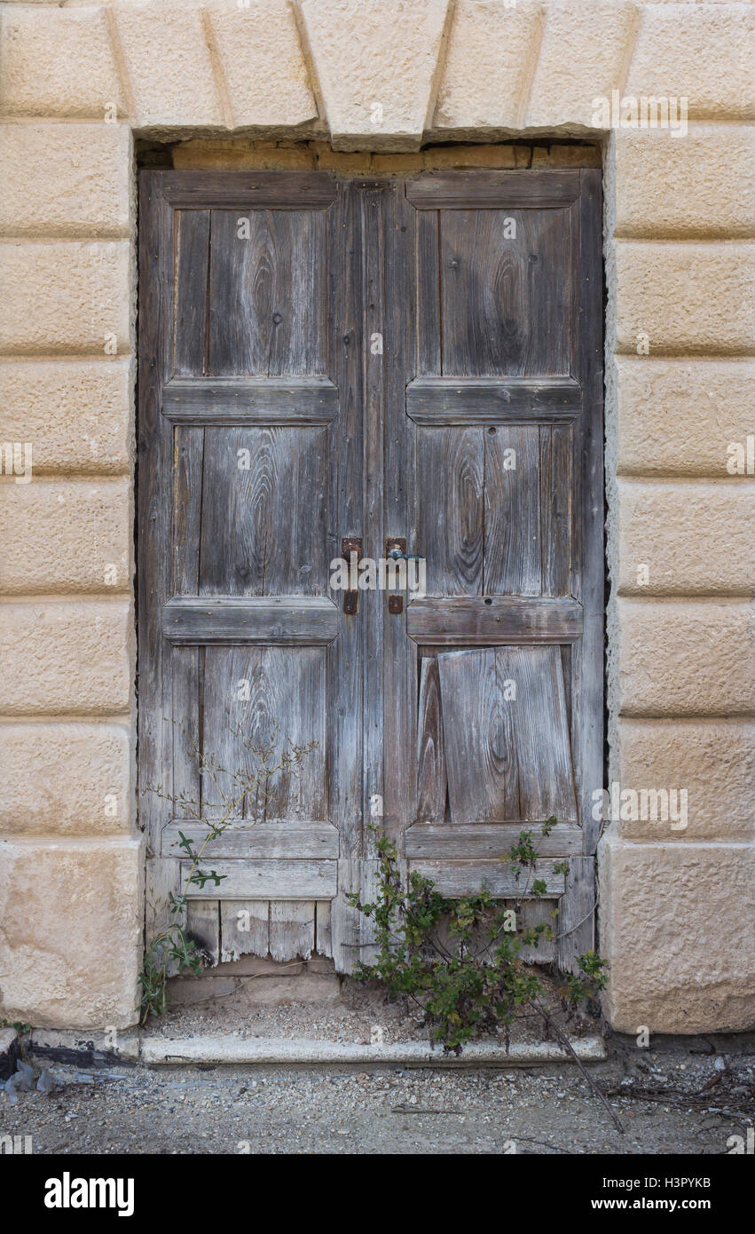Nice structure of a renewed facade of a building with a very old wooden ...