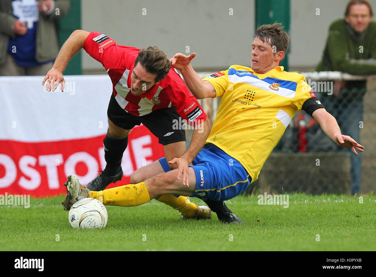 Sean Cronin of Wealdstone fouls Leigh Bremner of Hornchurch and is ...