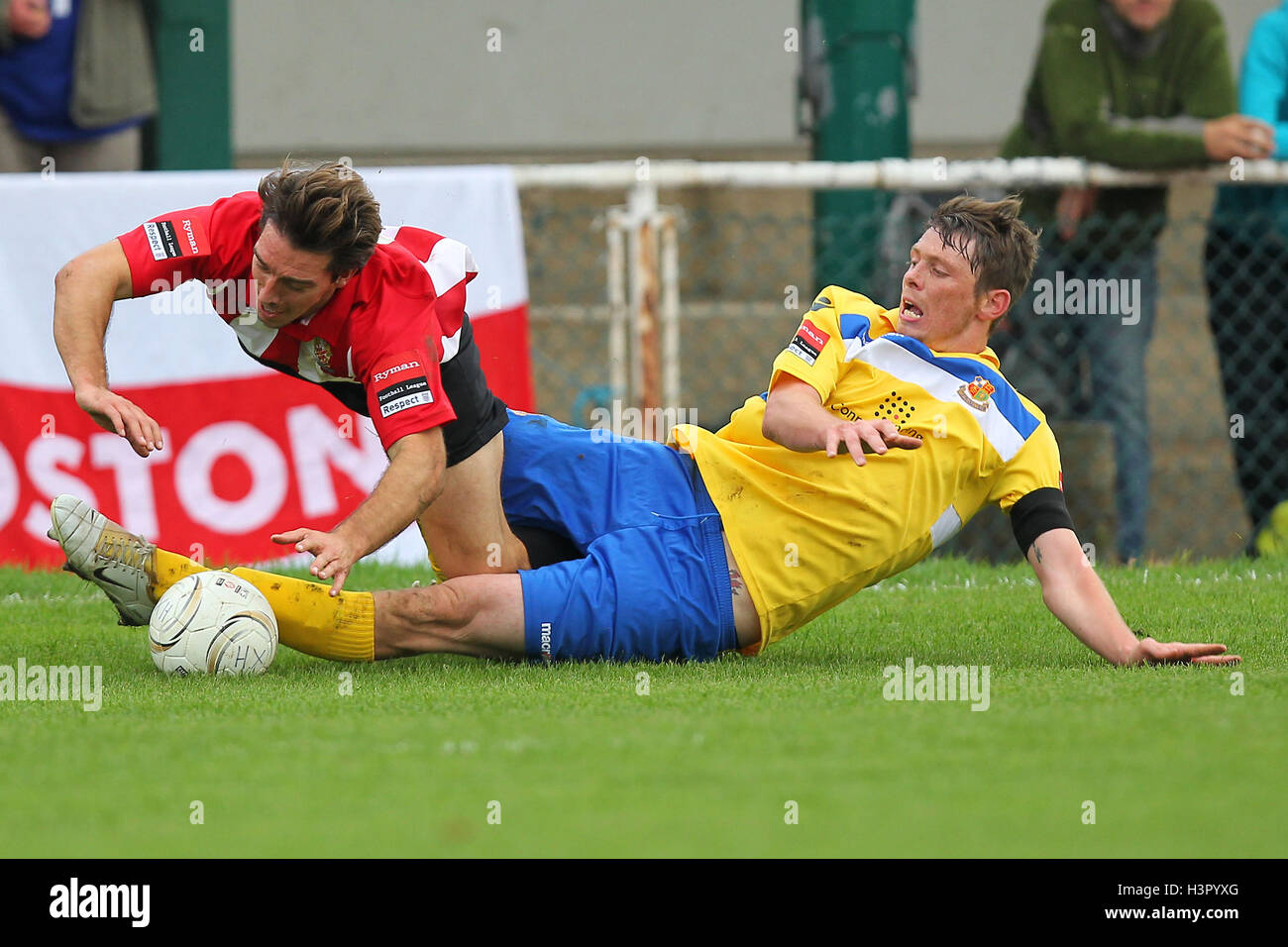 Sean Cronin of Wealdstone fouls Leigh Bremner of Hornchurch and is ...