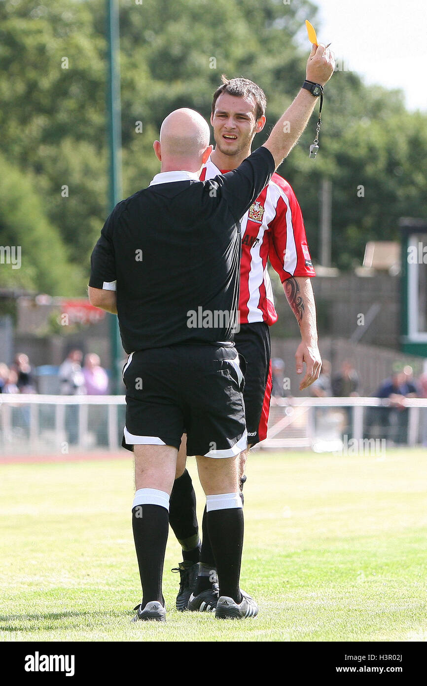 Martin Tuohy of Hornchurch receives a yellow card from referee Magill ...