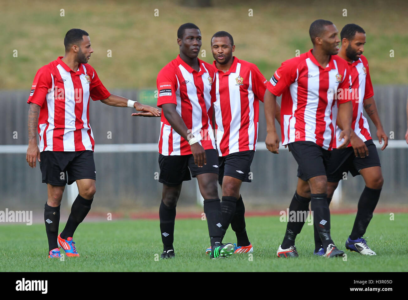 Josh Griffiths (2nd L) is congratulated on scoring the second goal for ...