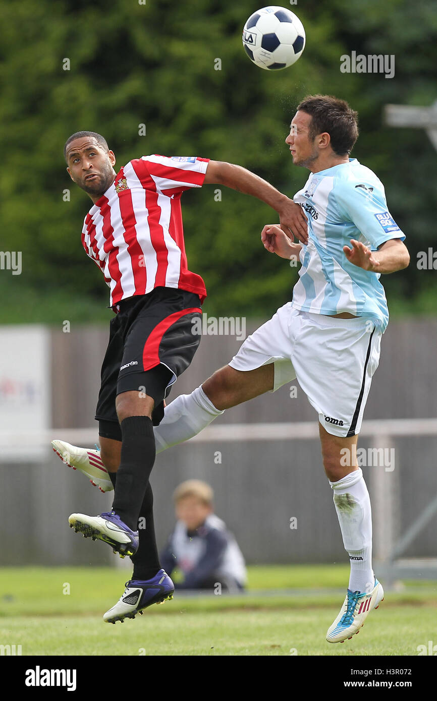 Jamie Price of Weston heads clear from Michael Spencer - AFC Hornchurch ...